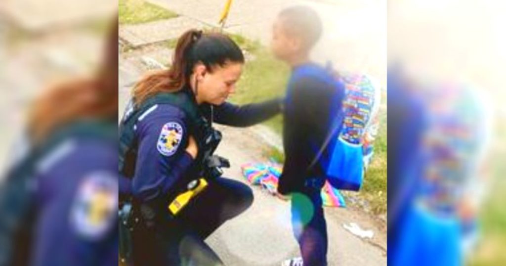 Boy Praying With Police Officer After He Stopped Her At Bus Stop