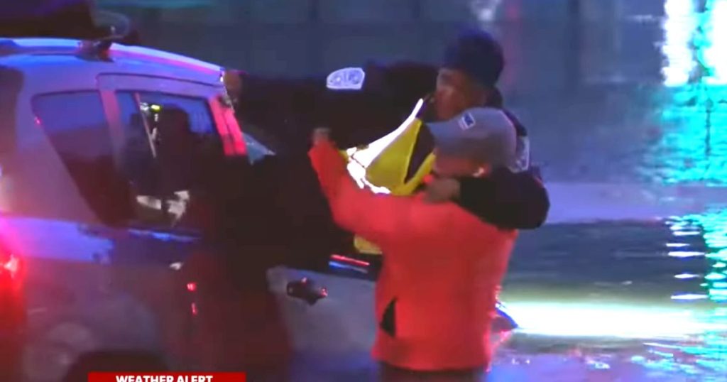 Weather Reporter Rescues Woman From Flooded Car