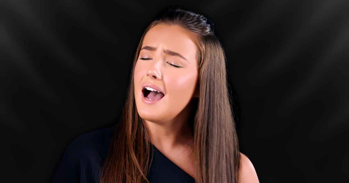 Young Woman with Angelic Voice Sings 'Bridge Over Troubled Water ...